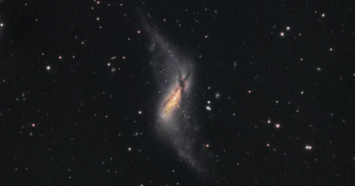 NGC 660, a starburst polar-ring galaxy | Telescope Live